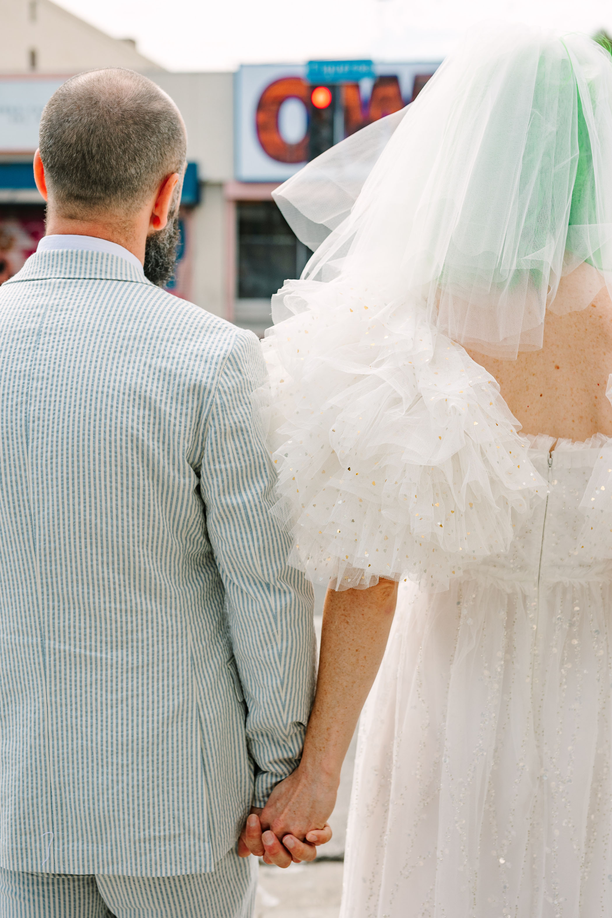 A Kooky + Colorful Highland Park Elopement...Officiated by a Puppet!