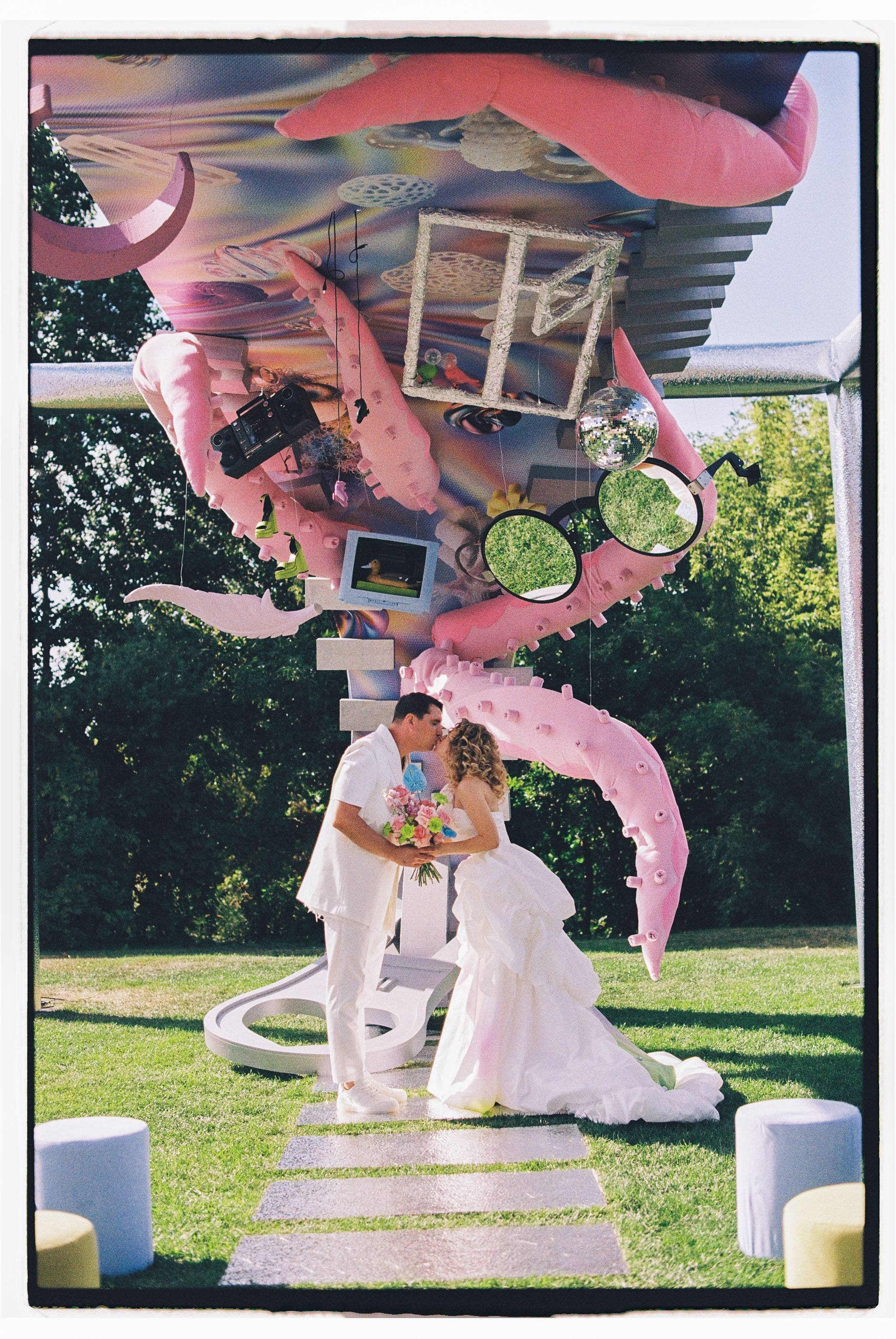 A Unique Outdoor Wedding Under a cyber Surrealist Art Installation